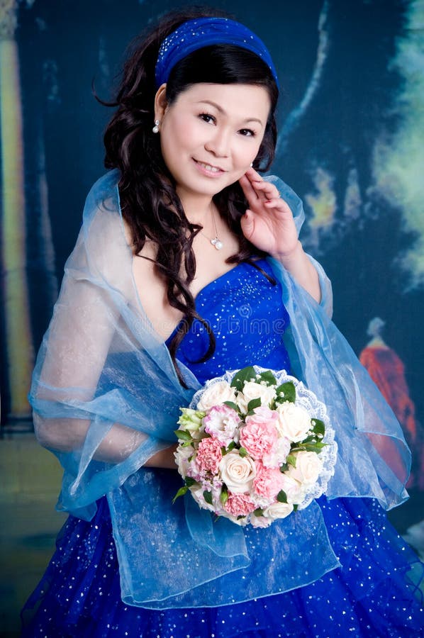 Asian lady close up stock photo. Image of blue, flowers - 29232568