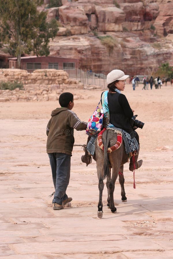 Asian Lady Riding Donkey in Petra Jordan Editorial Photo - Image of ...
