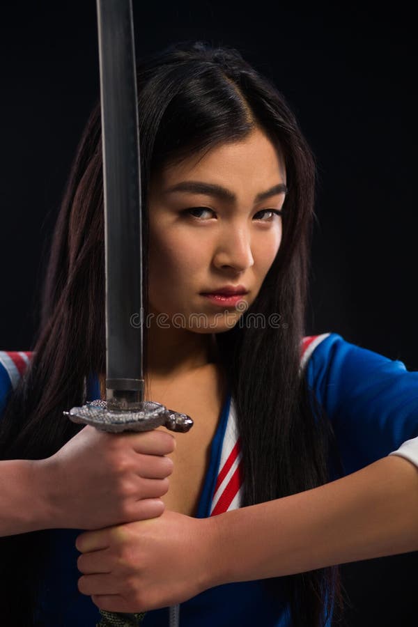 Asian Lady with Sword in Studio Stock Photo - Image of cloth, metal ...