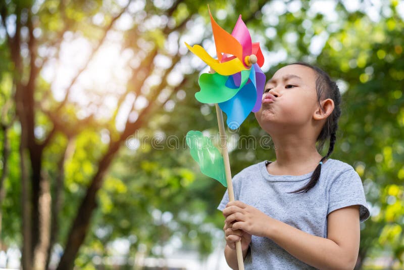 165 Little Girl Blowing Windmill Stock Photos - Free & Royalty-Free ... 165 Little Girl Blowing Windmill Stock Photos - Free & Royalty-Free ...