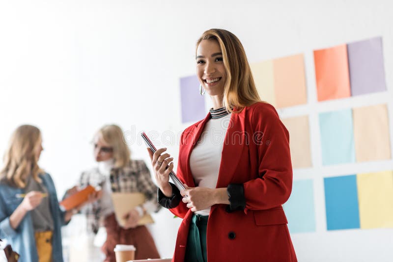 Asian Magazine Editors with Documents in Modern Office Stock Image ...