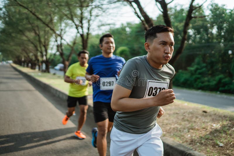 Asian Male Athlete Running Marathon Track Stock Image - Image of runner ...