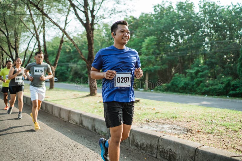 Asian Male Athlete Running Marathon Track Stock Image - Image of road ...