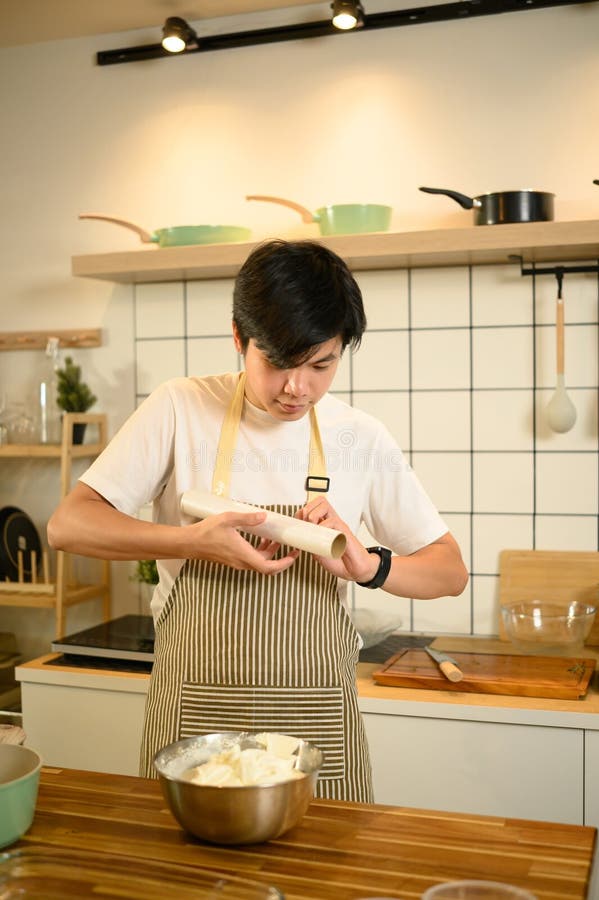 Asian Male Baker Wrapping Whipped Cream for Storage Stock Image - Image ...