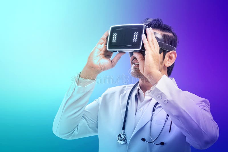Asian Male Doctor with a Stethoscope Using a Virtual Reality Device ...