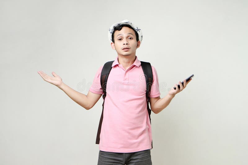 Man Backpacker Hold Mobile Phone and Tumbler Bottle with Confused ... Man Backpacker Hold Mobile Phone and Tumbler Bottle with Confused ...