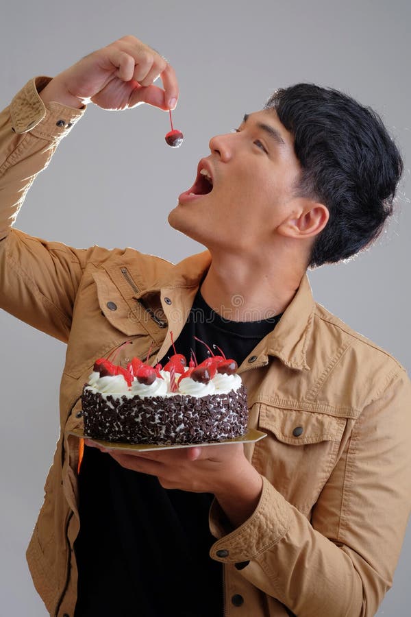Asian Man with Birthday Ice-cream Cake on Fire Stock Image - Image of ...