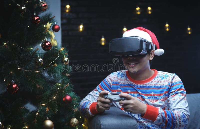 Asian Man with Christmas Costume Playing Virtual Reality Sitting Stock ...