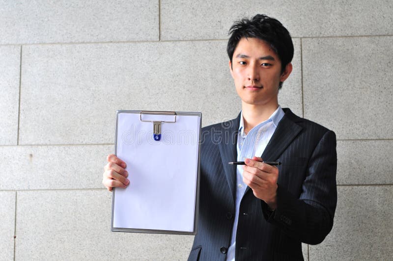 Asian Man with Clipboard Asking for Signature Stock Image - Image of ...