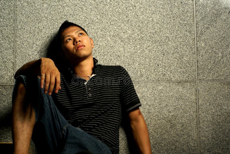 Asian man contemplation stock image. Image of alone, asian - 8524209