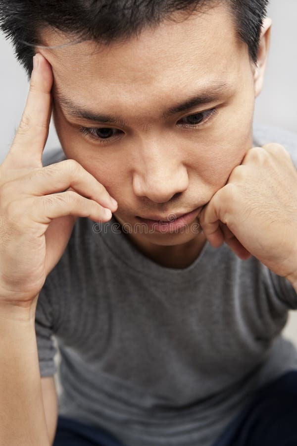 Asian man in depression stock photo. Image of person - 10546328