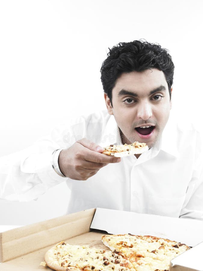 Asian man eating pizza stock image. Image of face, ethnicity - 7319751