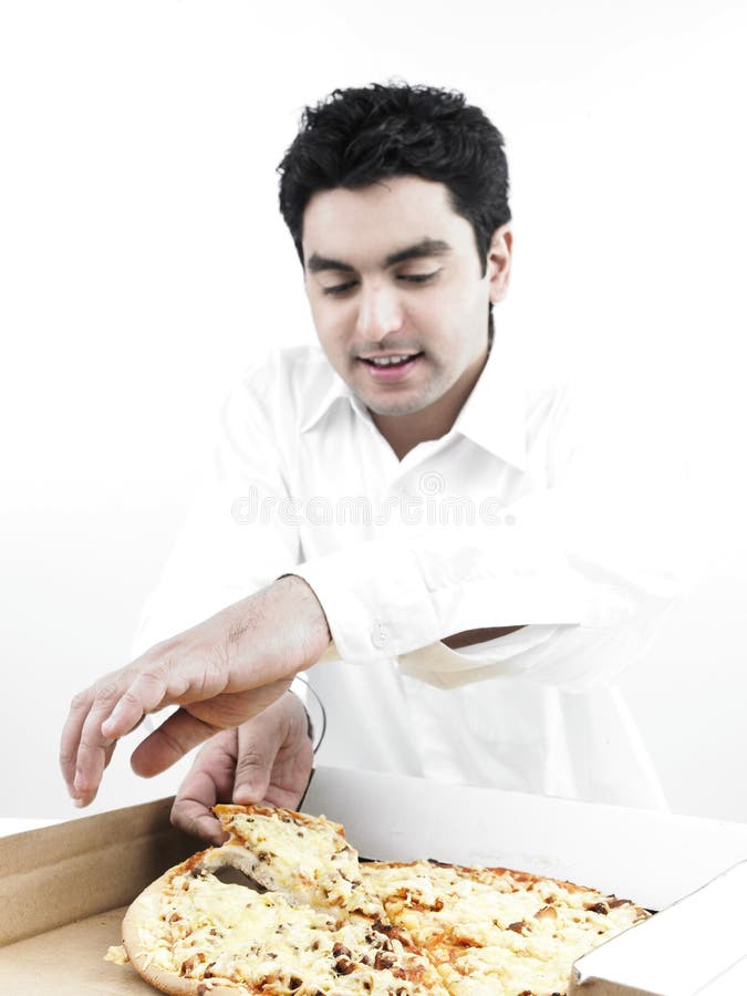 Asian man eating pizza stock image. Image of hair, baked - 7320443