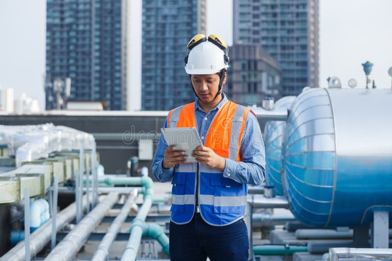 Asian Man Engineer Holding Tablet Working at Rooftop Building ...