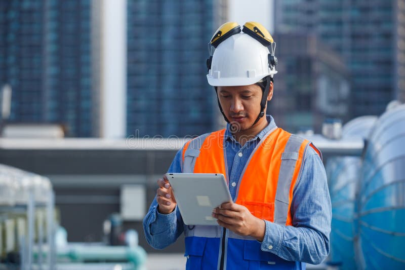 Asian Man Engineer Holding Tablet Working at Rooftop Building ...