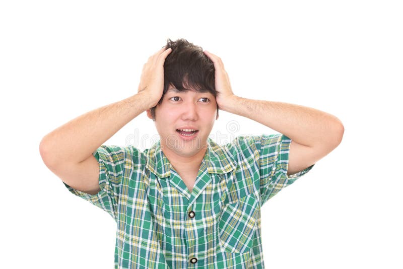 Frustrated Asian man stock photo. Image of handsome - 143205486
