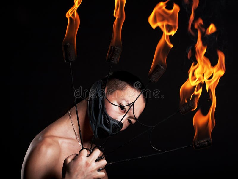 Asian man with fire show stock image. Image of backdrop - 11071523
