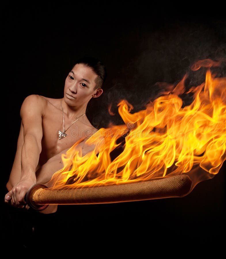 Asian man with fire show stock image. Image of flaming - 11071533