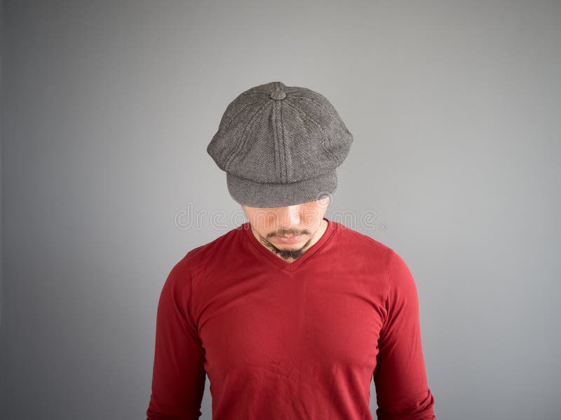 Asian man with flat cap. stock image. Image of handsome - 65011713