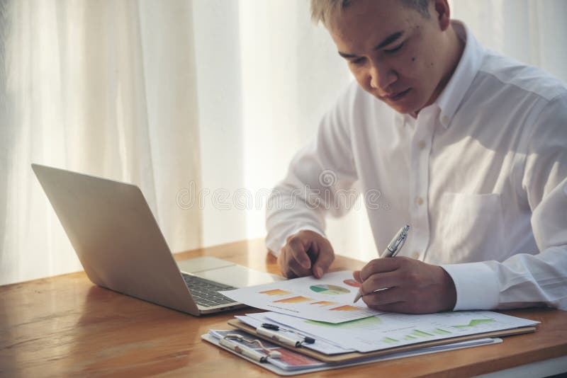 Asian Businessman Type Keyboard Write Financial Graph Chart Planning ...