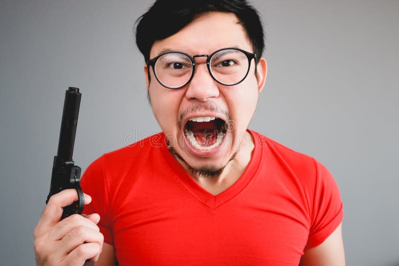 Asian man with a gun. stock photo. Image of armed, crime - 59530486