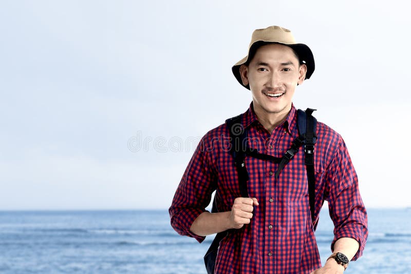 Asian Man with Hat and Backpack Traveling To the Beach Stock Image ...