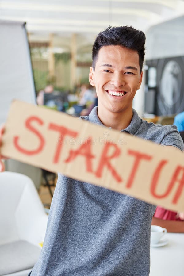Man Holds Start Up Sign Stock Photos - Free & Royalty-Free Stock Photos ...