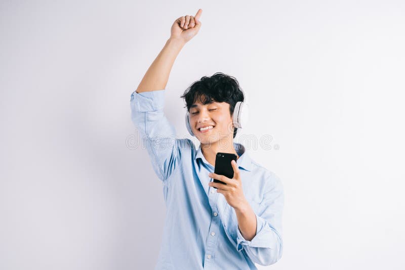 Asian Man is Listening To Music and Repeat Stock Photo - Image of ...