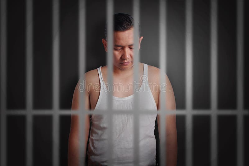Young man locked in jail stock image. Image of people - 106131659