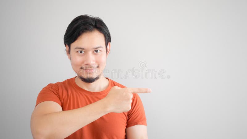 Asian man pointing stock image. Image of pointing, attractive - 73250495