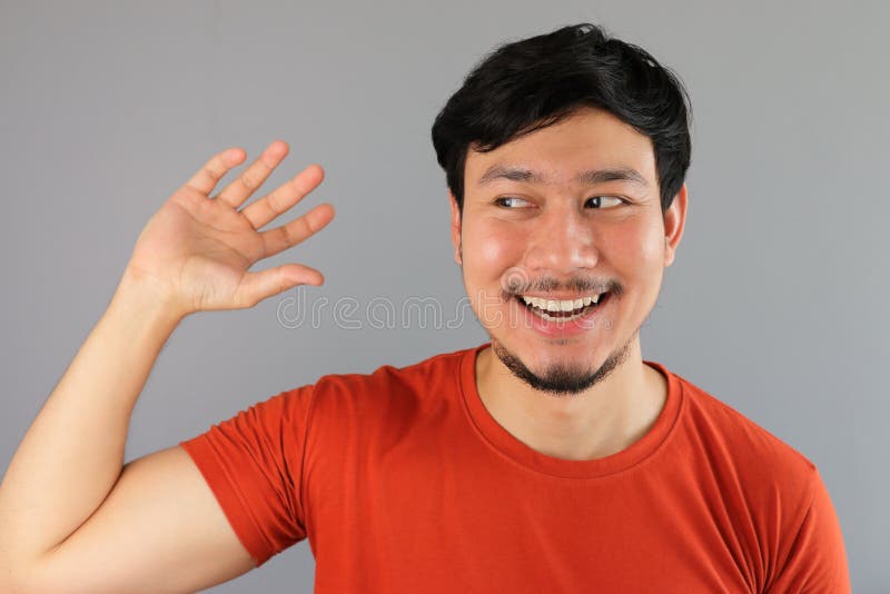 Asian Man Pretends To Pick Something Up. Stock Photo - Image of human ...
