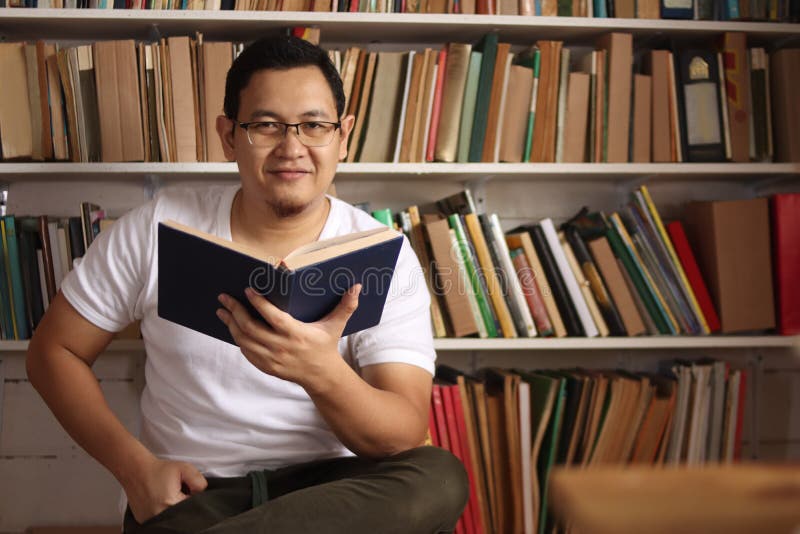 Asian Man Reading Book in Library, Educational Concept. Happy Smiling ...