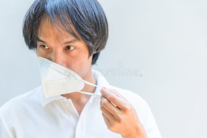A Asian Man Remove the N95 Mask Stock Photo - Image of coronavirus ...