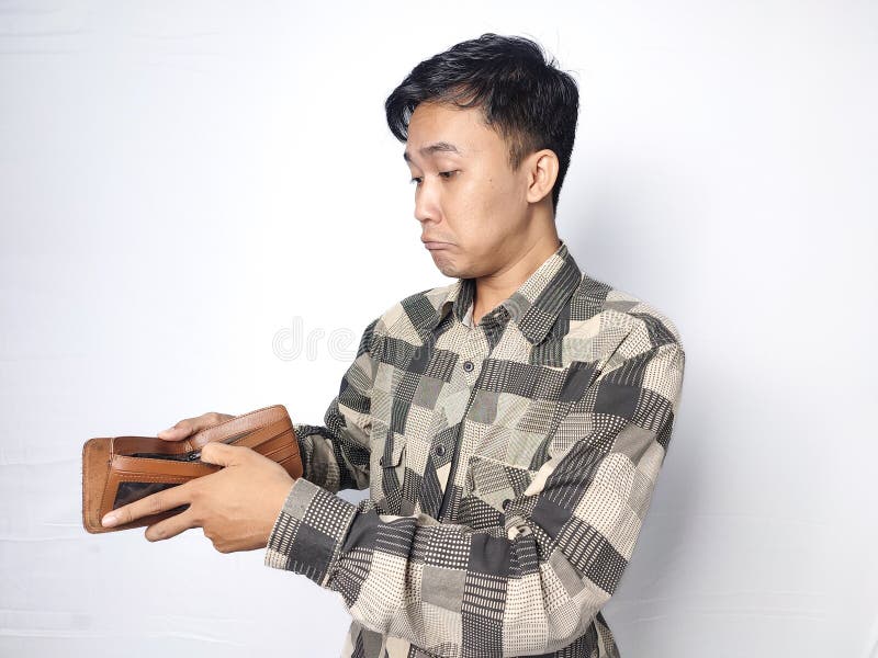 Asian Man with Sad Expression Who is Surprised Looking at His Empty ...