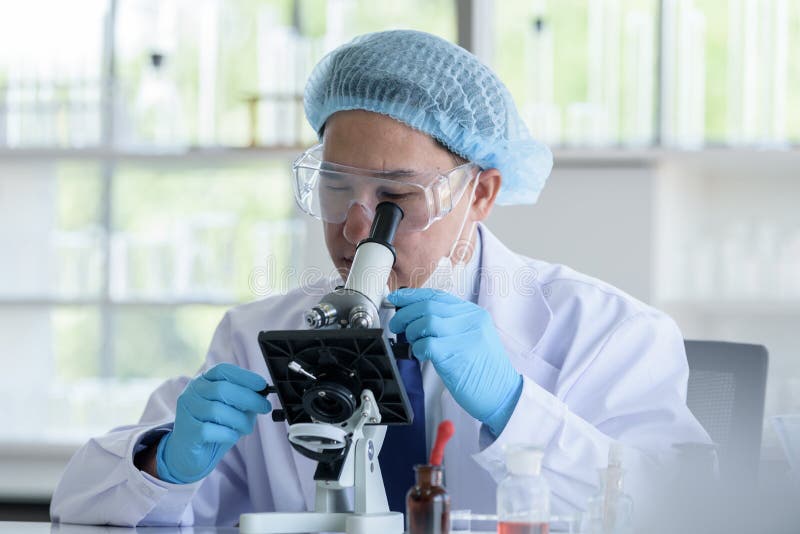 Asian Man Scientist Researching and Learning in a Laboratory Stock ...