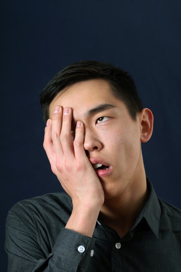 Asian Man Showing Facepalm and Rolling Eyes Up Stock Image - Image of ...