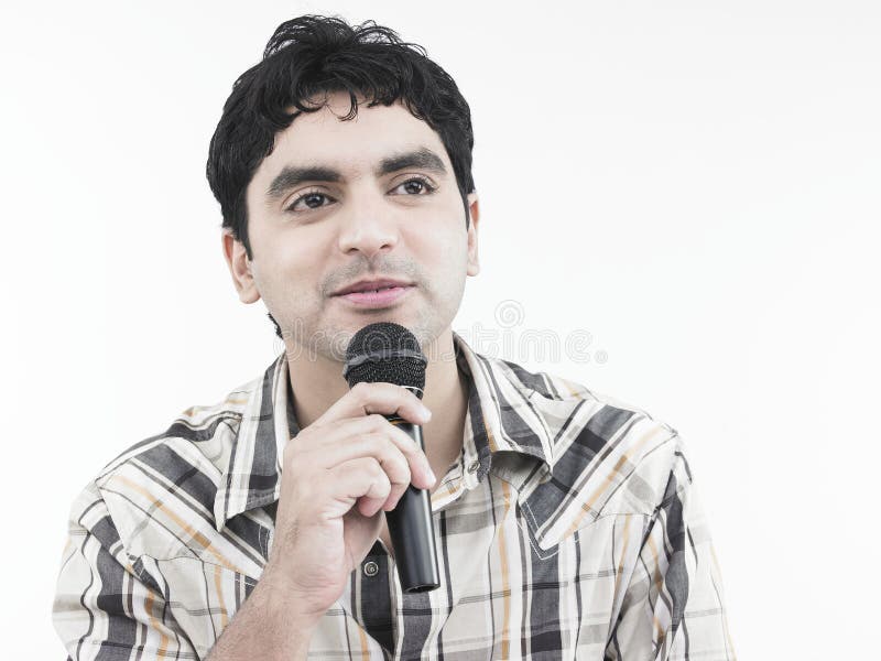 Asian man singing a song stock image. Image of holding - 7320423