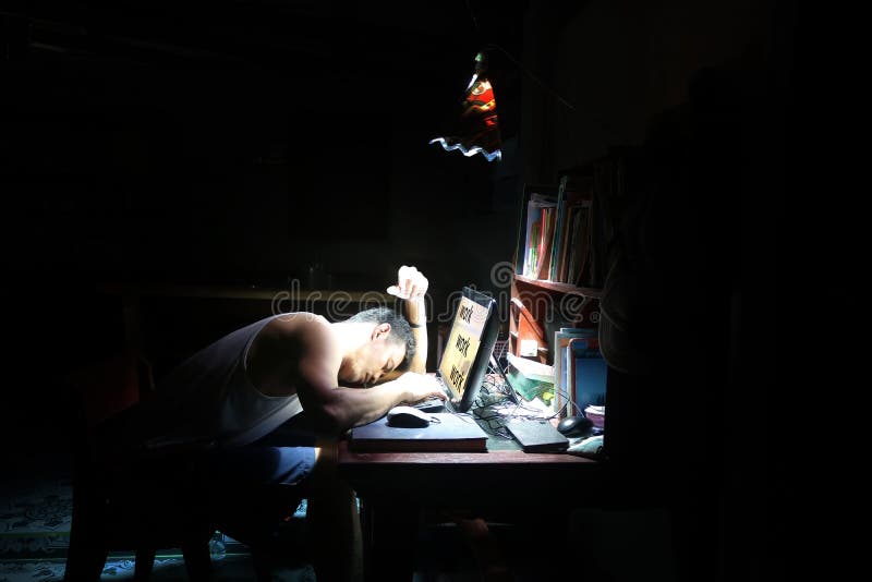 Asian Man Sleeping on the Desk and a Computer in the House Stock Photo ...