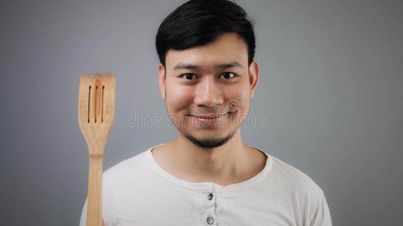 Asian Man with Spade of Frying Pan. Stock Image - Image of wooden ...
