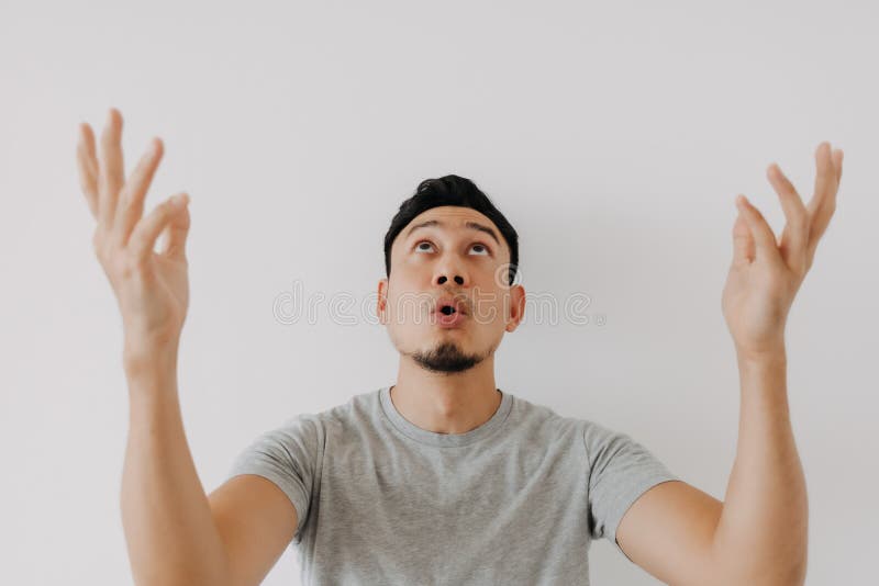 Man Surprise and Curious Face because of Something is Falling Down ...