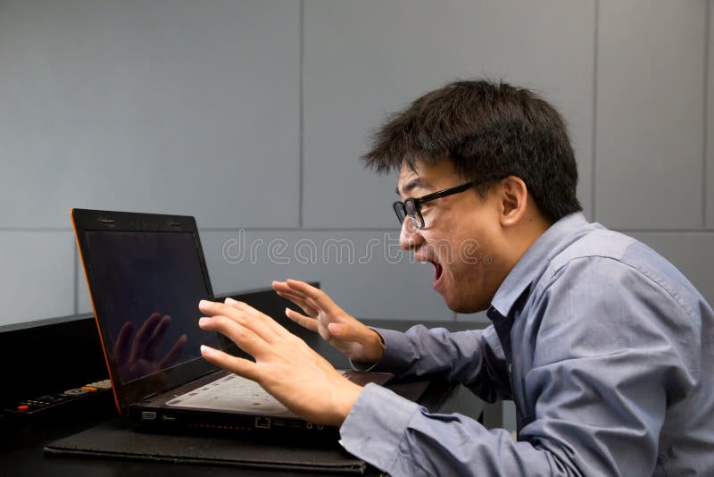 Asian Man Surprised with Laptop Computer Stock Photo - Image of smile ...