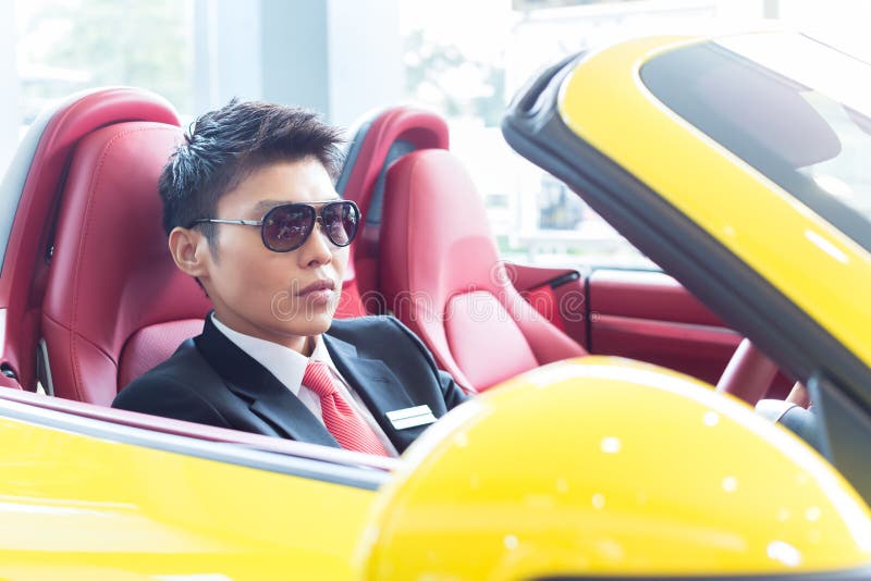 Asian Man Testing Sports Car Stock Photo - Image of shop, showroom ...