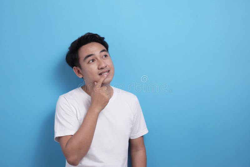 Asian Man Happily Thinking Stock Photos - Free & Royalty-Free Stock ...