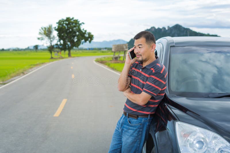 Asian man use mobile phone stock image. Image of handsome - 59498059