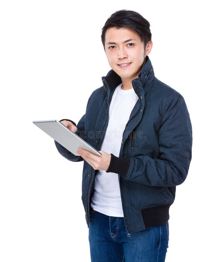 Asian Man use of tablet stock photo. Image of asian, korean - 46730764