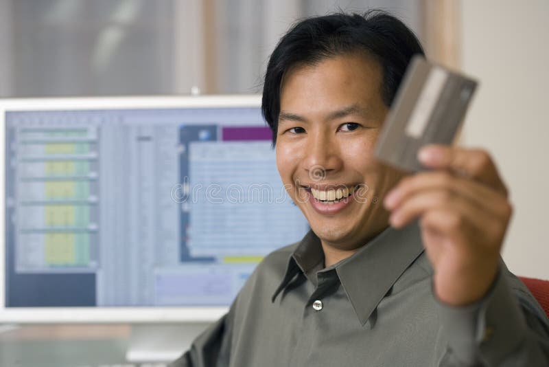 Asian Man Using Credit Card and Computer Stock Image - Image of online ...