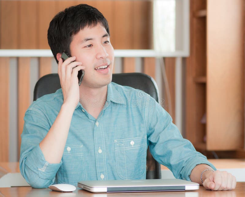 Asian Man Using Mobile Phone Stock Image - Image of handsome, online ...