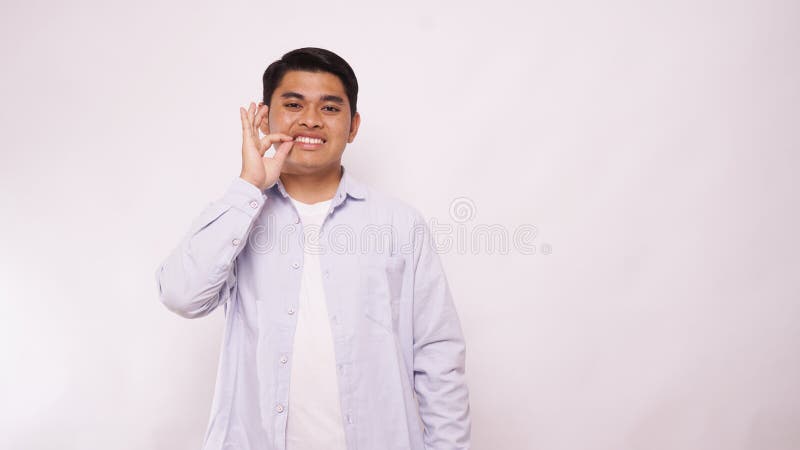 Asian Young Man Make an ASL American Sign Language Using His Hand Stock ...