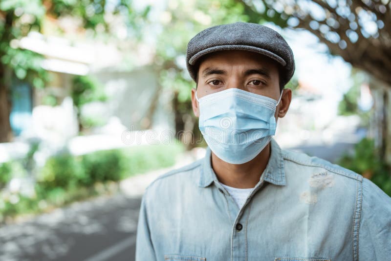 Asian Man Wearing Face Mask before Going Out Stock Photo - Image of ...