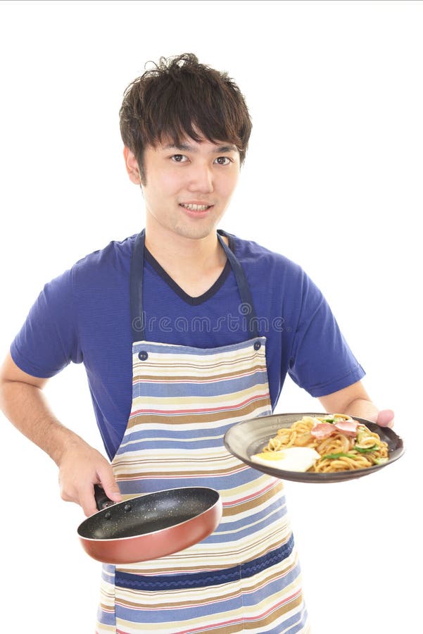 Cooking man in apron stock image. Image of dish, adult - 126135489
